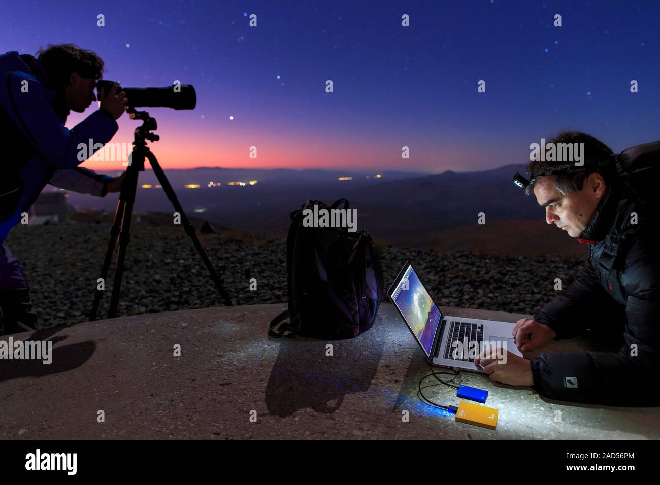 Astrophotography. Astrophotographers taking photographs of the night ...