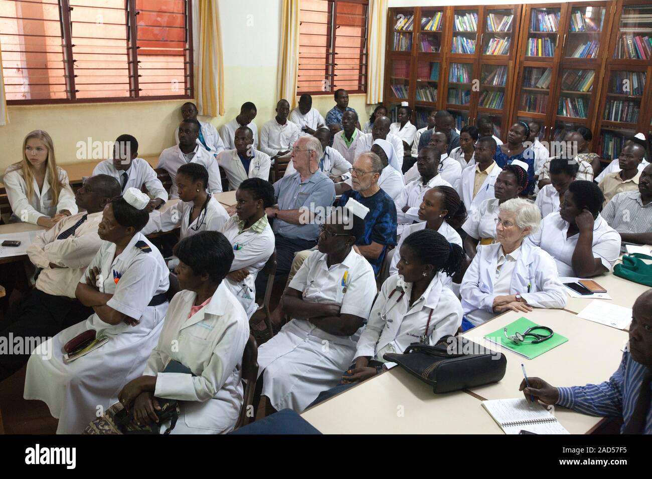Meeting of hospital staff, including doctors and nurses. Photographed ...