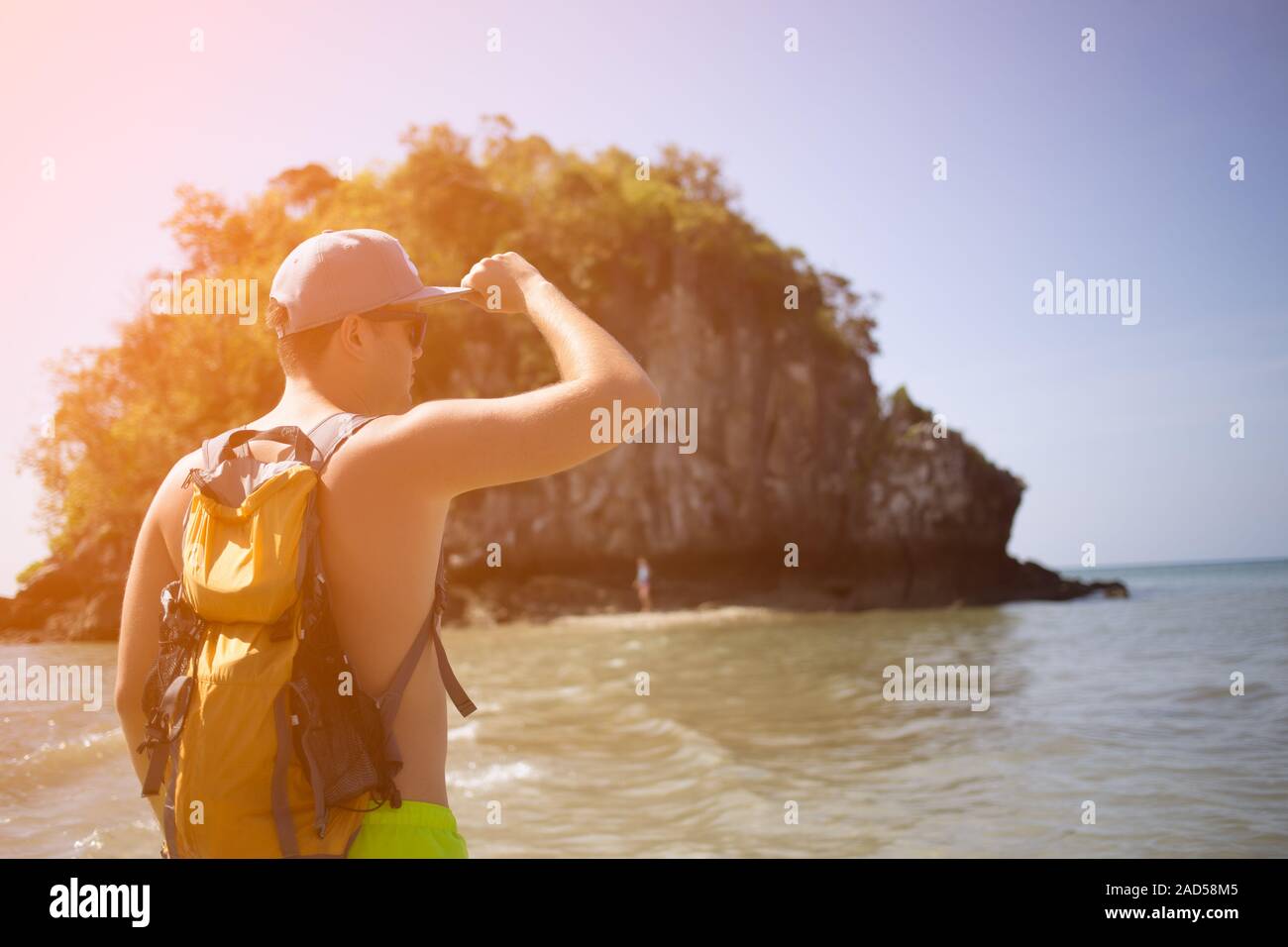 Man backpack sun hi-res stock photography and images - Alamy