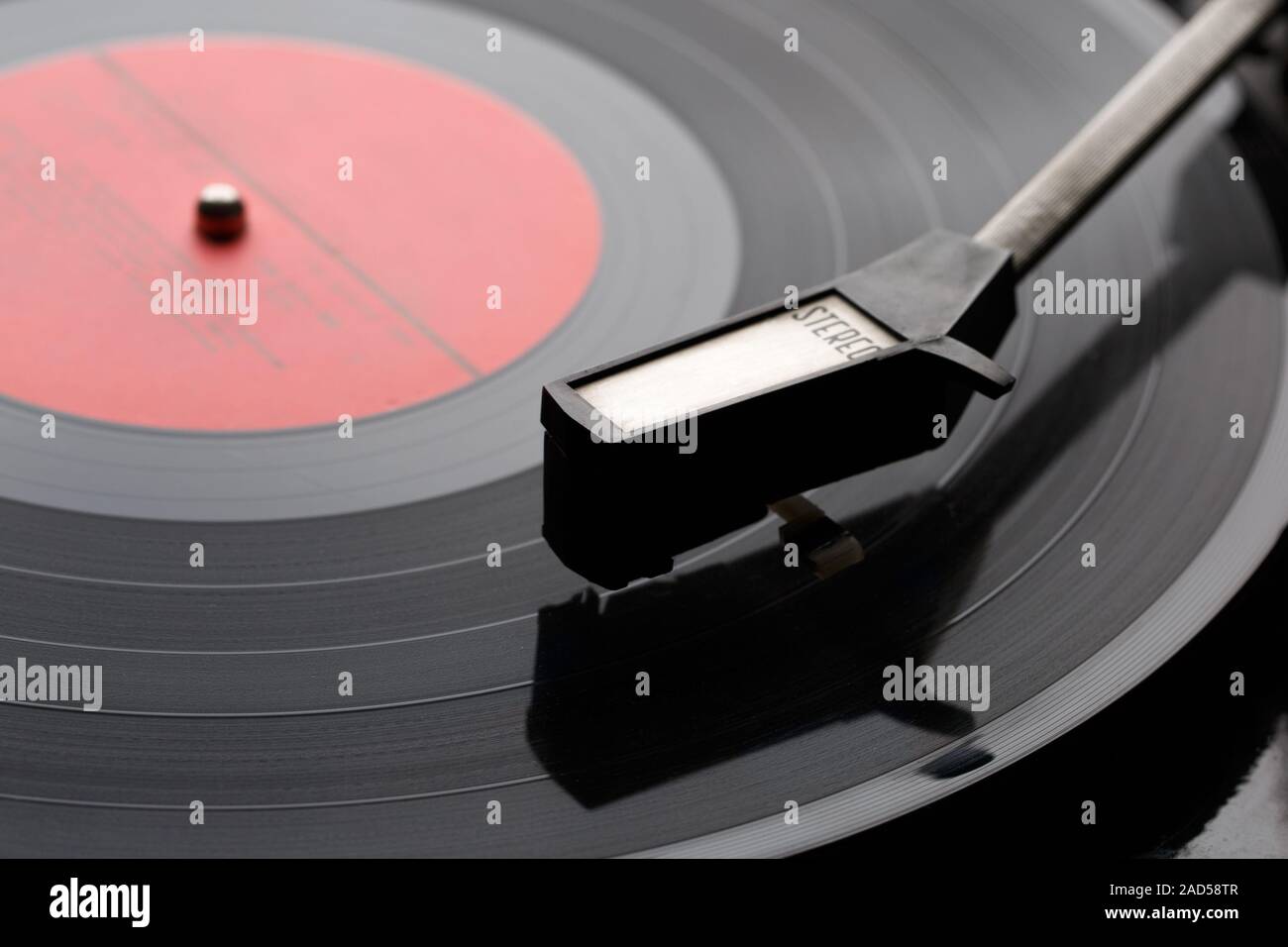 Black vinyl plate with player Stock Photo - Alamy