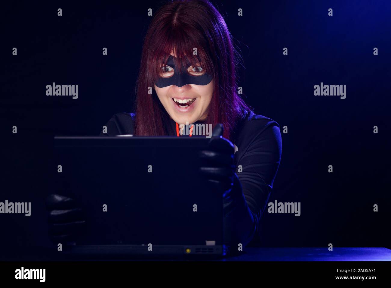 Female thief in black mask hi-res stock photography and images - Alamy