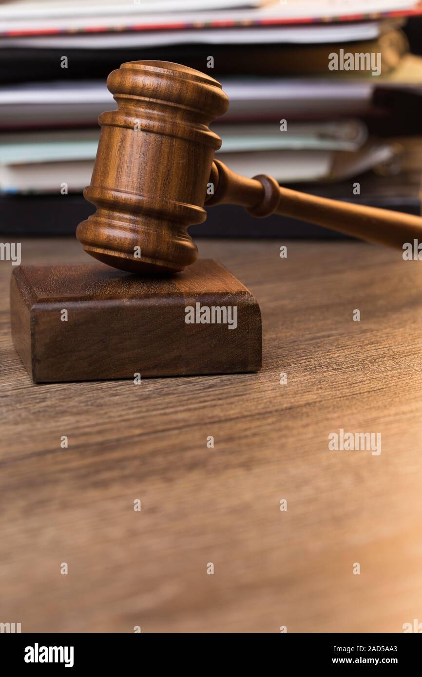 Image of hammer against documents Stock Photo - Alamy