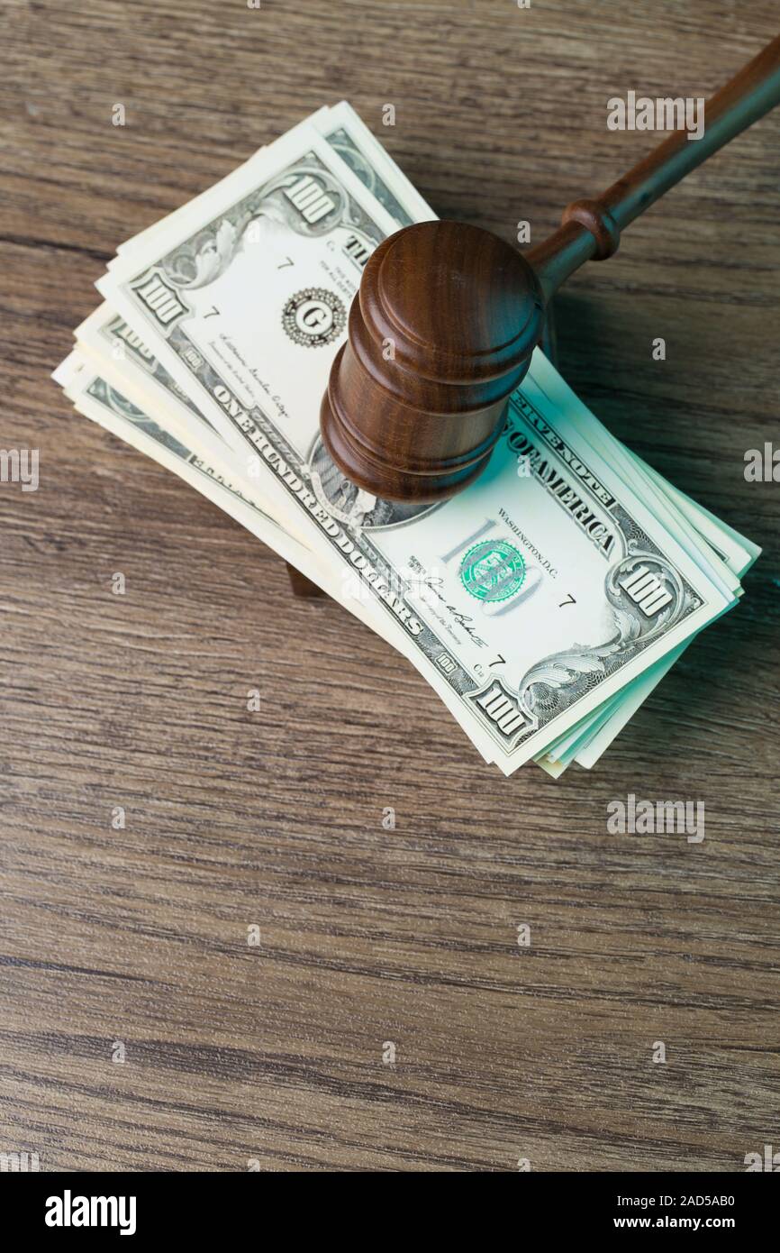 Picture of hammer with dollars Stock Photo - Alamy