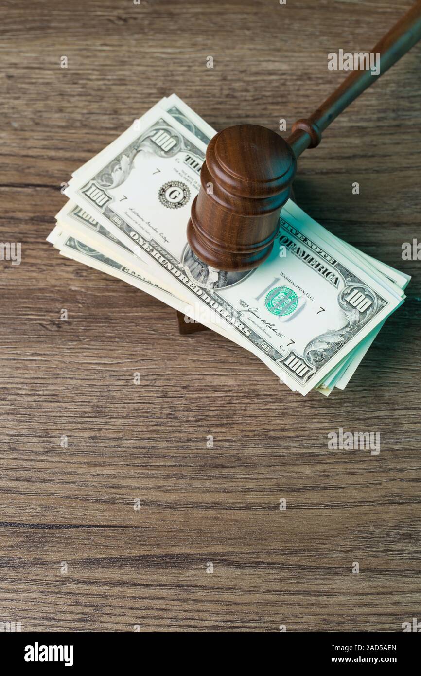 Photo of hammer with bills Stock Photo - Alamy