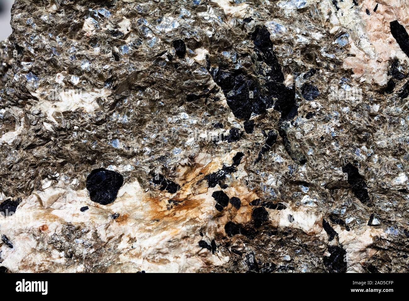 Surface of stone Tourmaline and Muscovite Stock Photo - Alamy