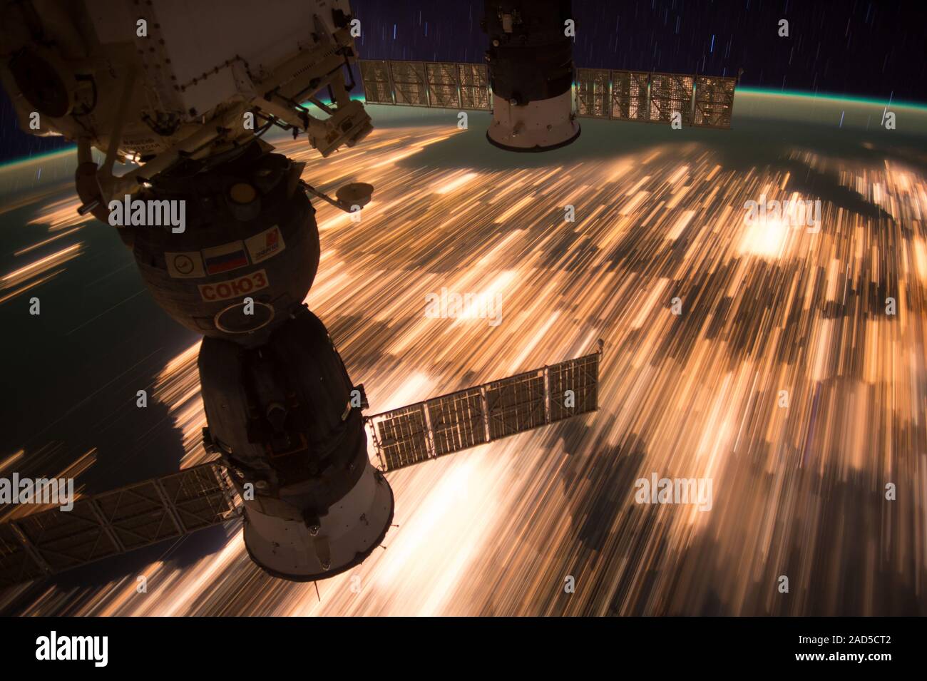 Night lights over Earth, long-exposure photograph taken by astronauts ...