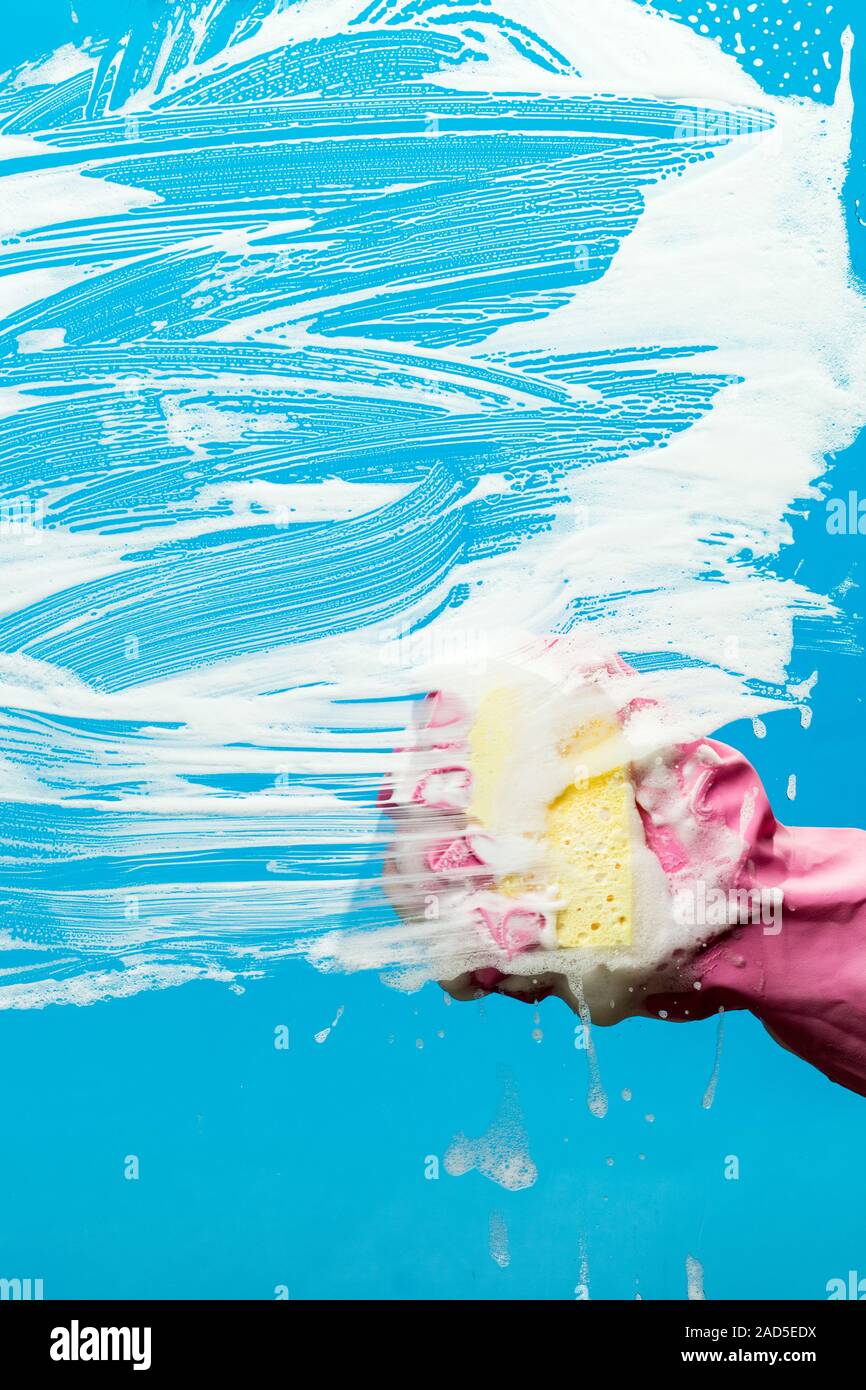 Photo of hand with sponge Stock Photo - Alamy