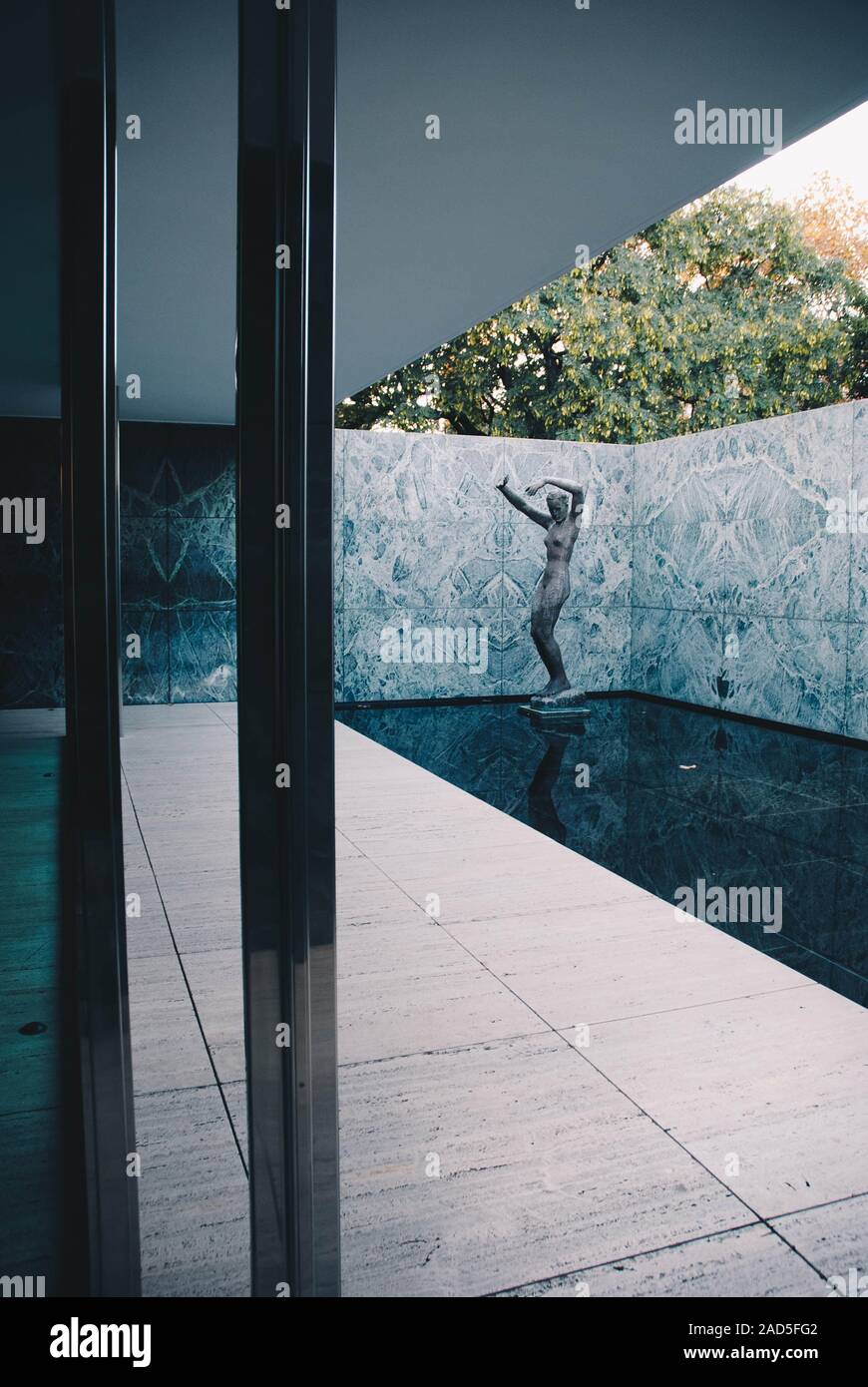 Statue on the water pond of the Barcelona Pavilion of Mies van der Rohe ...