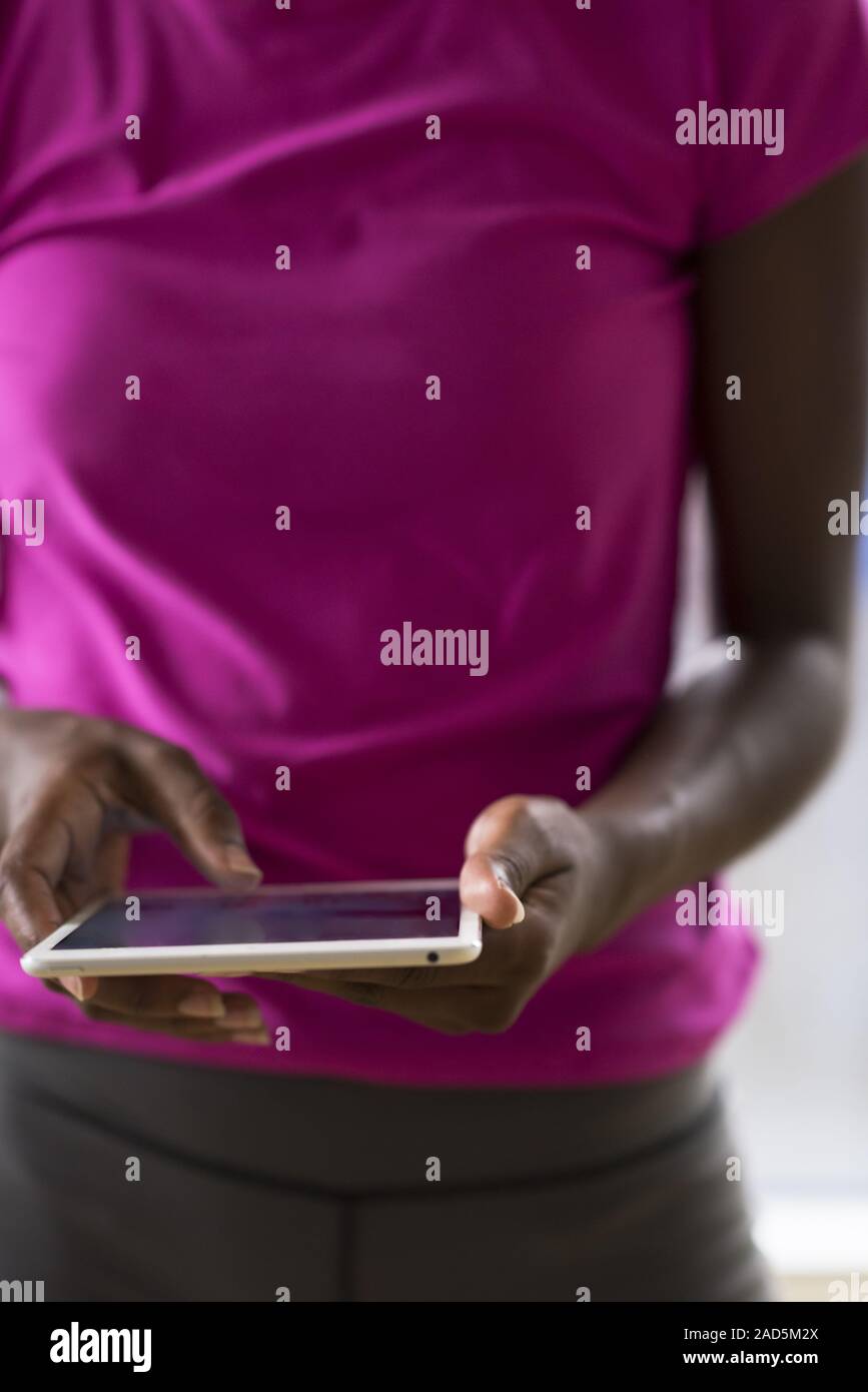 african american woman using tablet Stock Photo - Alamy