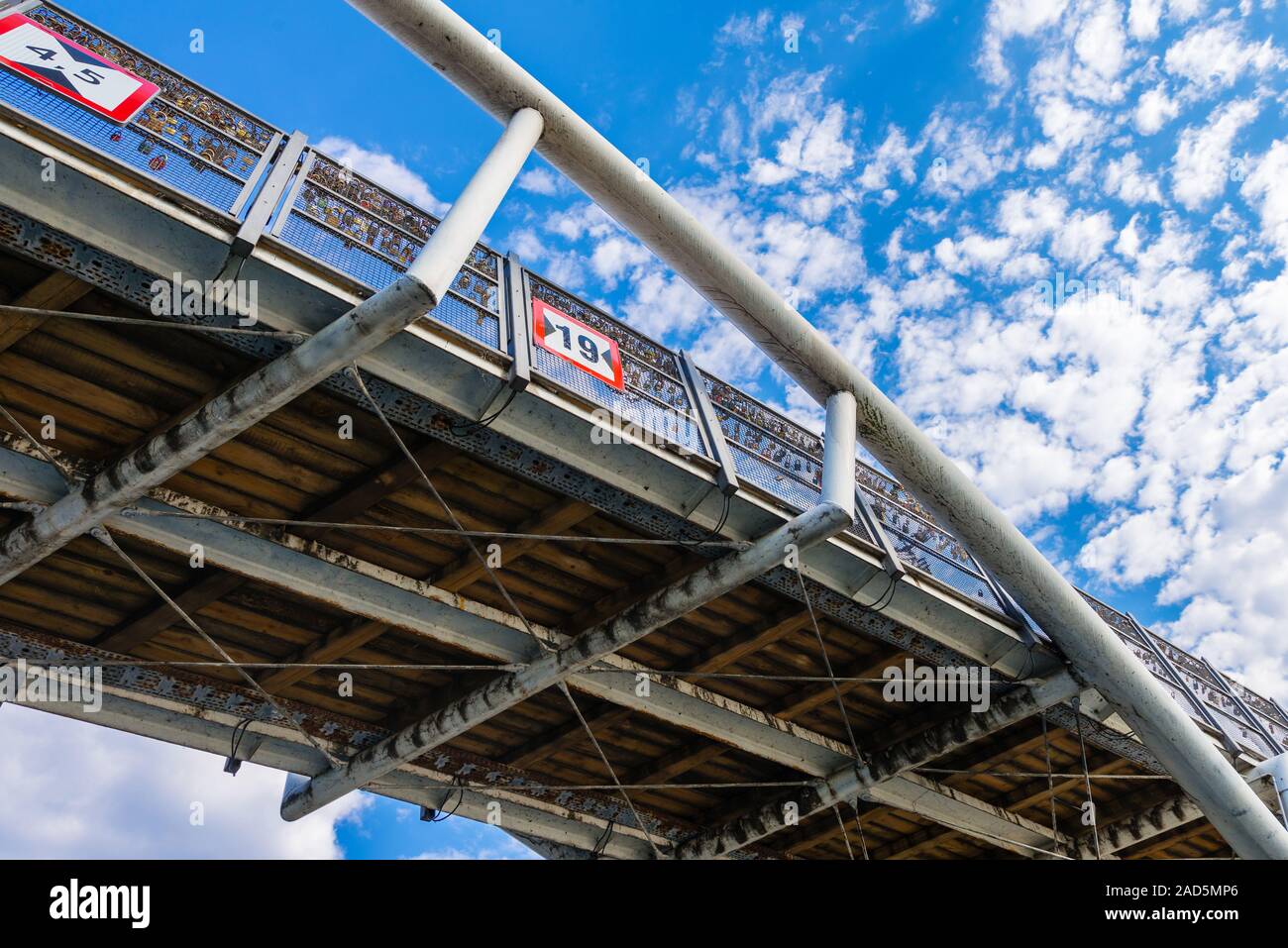 Under the bridge - steel-wooden bridge construction seen from below ...