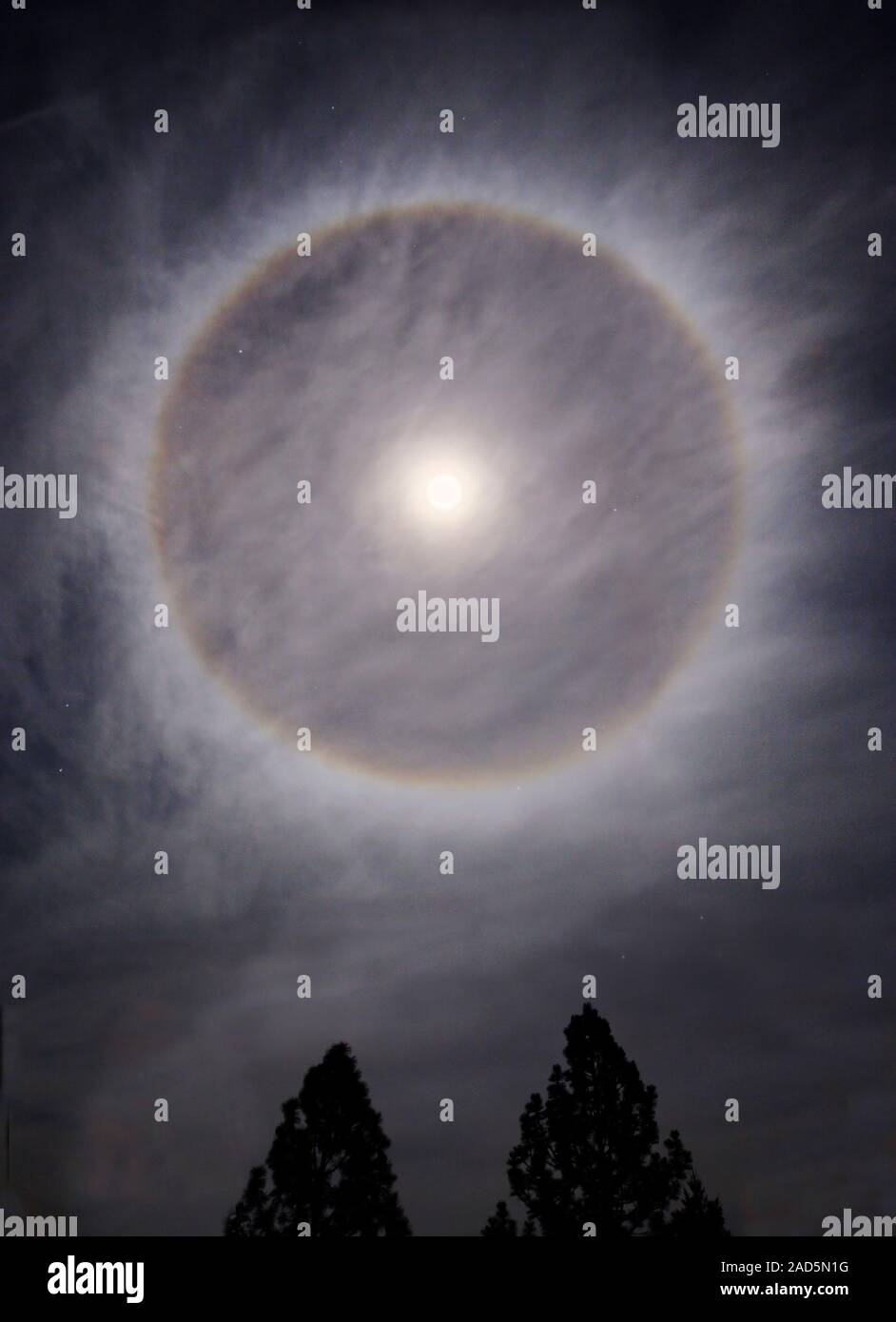 Moon halo. Halo of light around the Moon, known as a paraselene, or ...