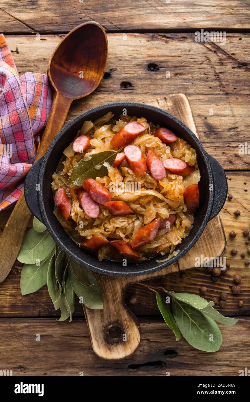 Cabbage braised with sausages, sauerkraut. German cuisine Stock Photo ...