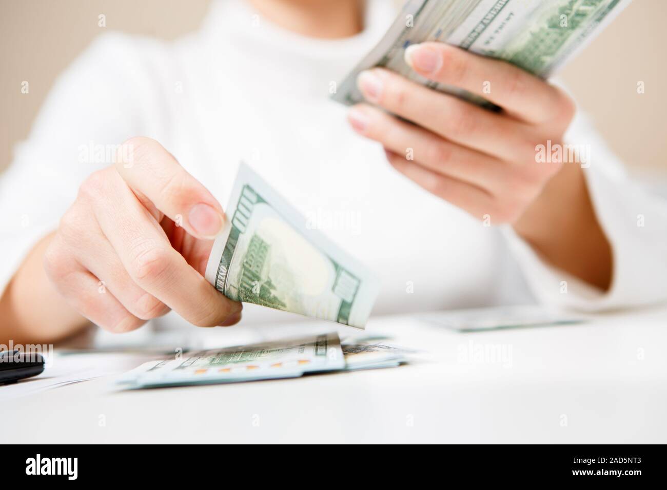 Hands counting money, close up Stock Photo - Alamy