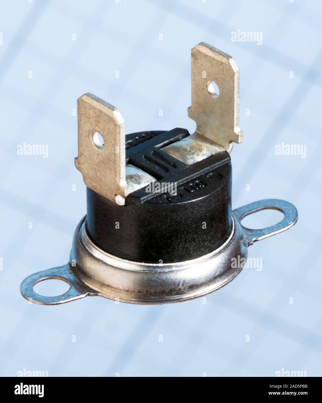 A bi-metal thermal switch. A bi-metal switch is mechanical and consists ...