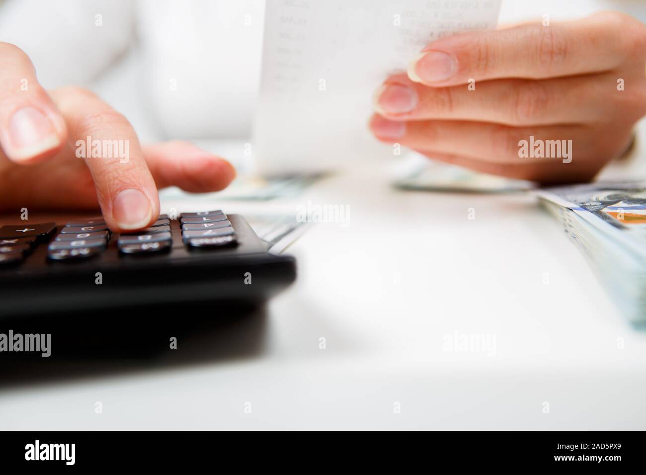 savings, finances, economy and home concept - close up of hands with ...