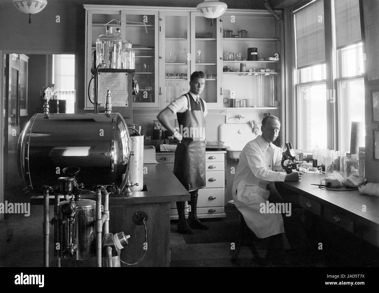 Bacteriology research, 1930s. US bacteriologist Gordon Ernest Davis ...