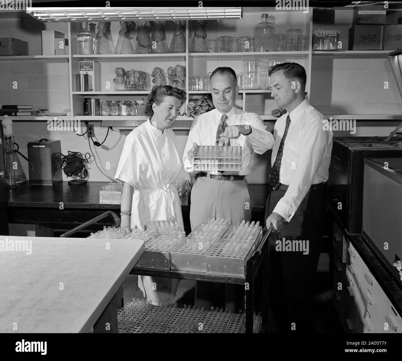 Serology test demonstration, 1950s. US bacteriologist David Buell ...