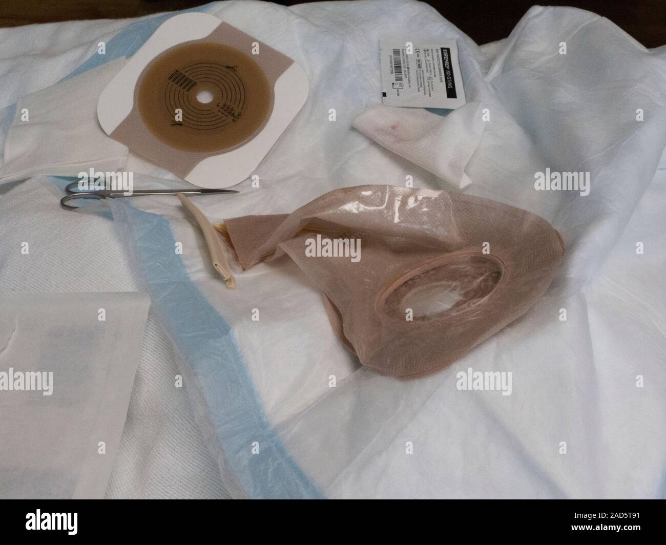 Colostomy bag. Close-up of supplies used to affix a new colostomy bag ...