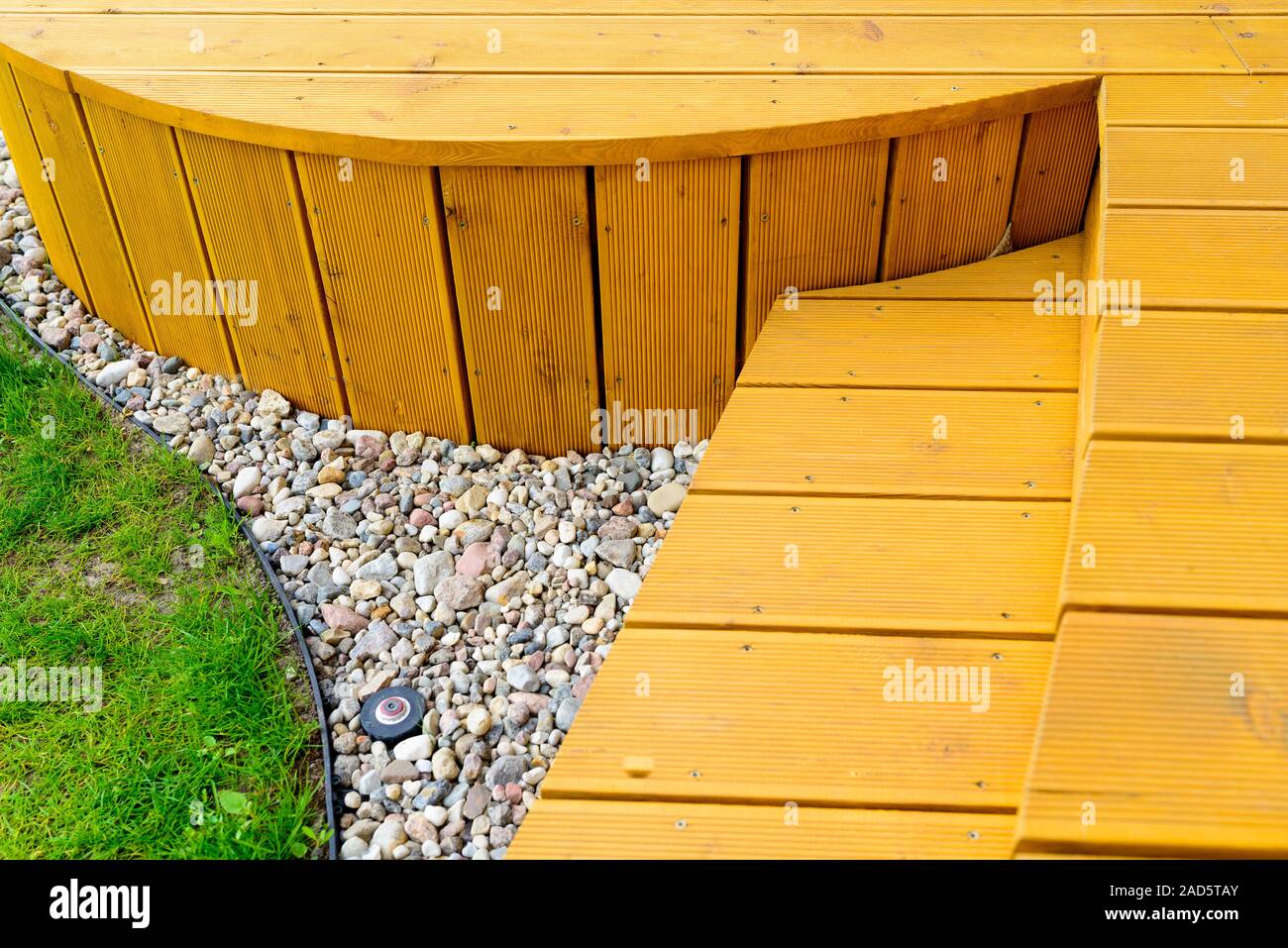 Terrace in formal garden after power washing - bright green lawn and ...