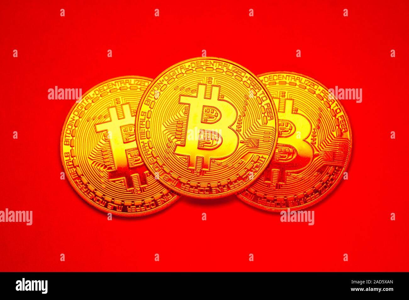 Bitcoin blockchain cryptocurrency coins on a hot red background Stock ...