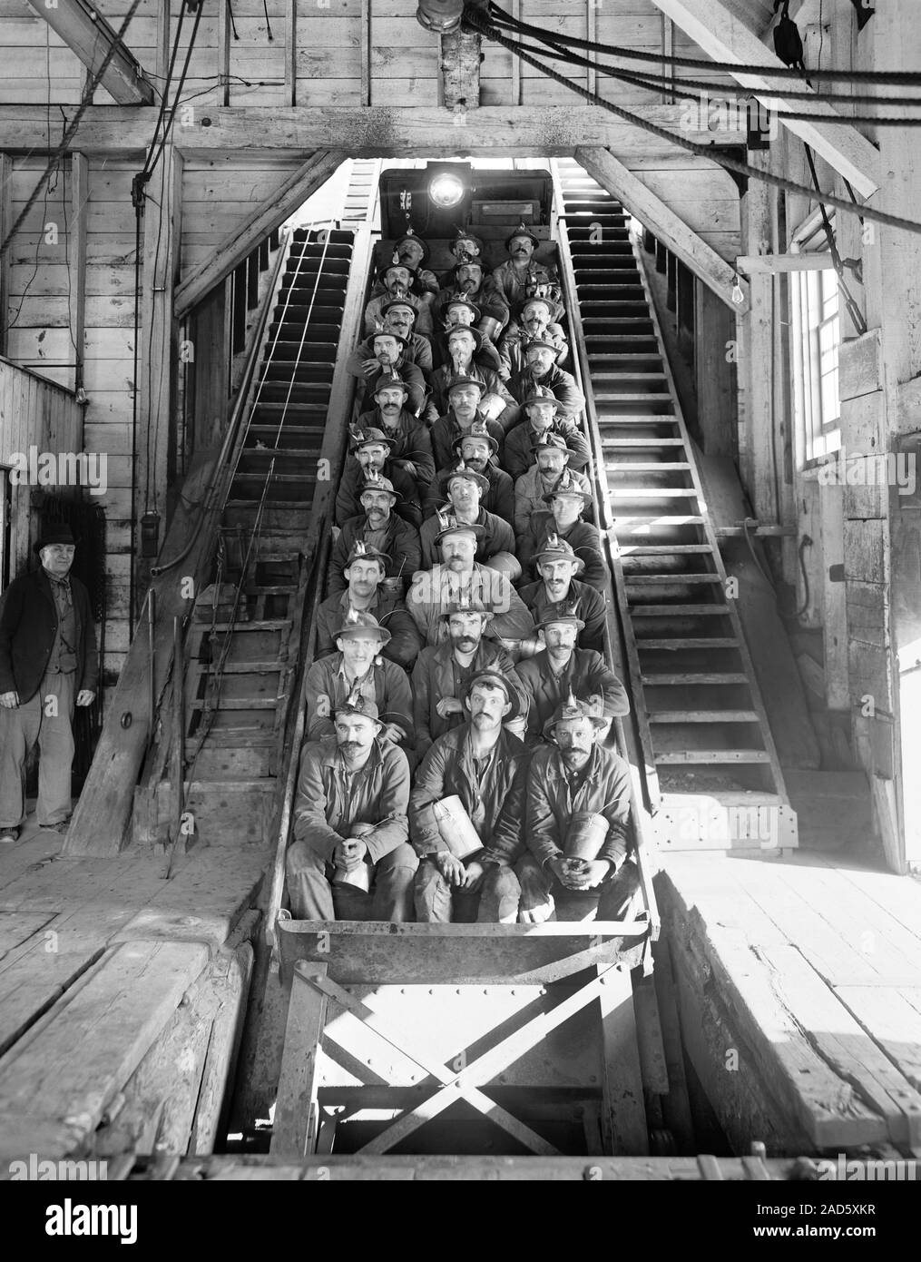 Miners emerging from shaft Number 2, Calumet and Hecla Mine, a copper ...