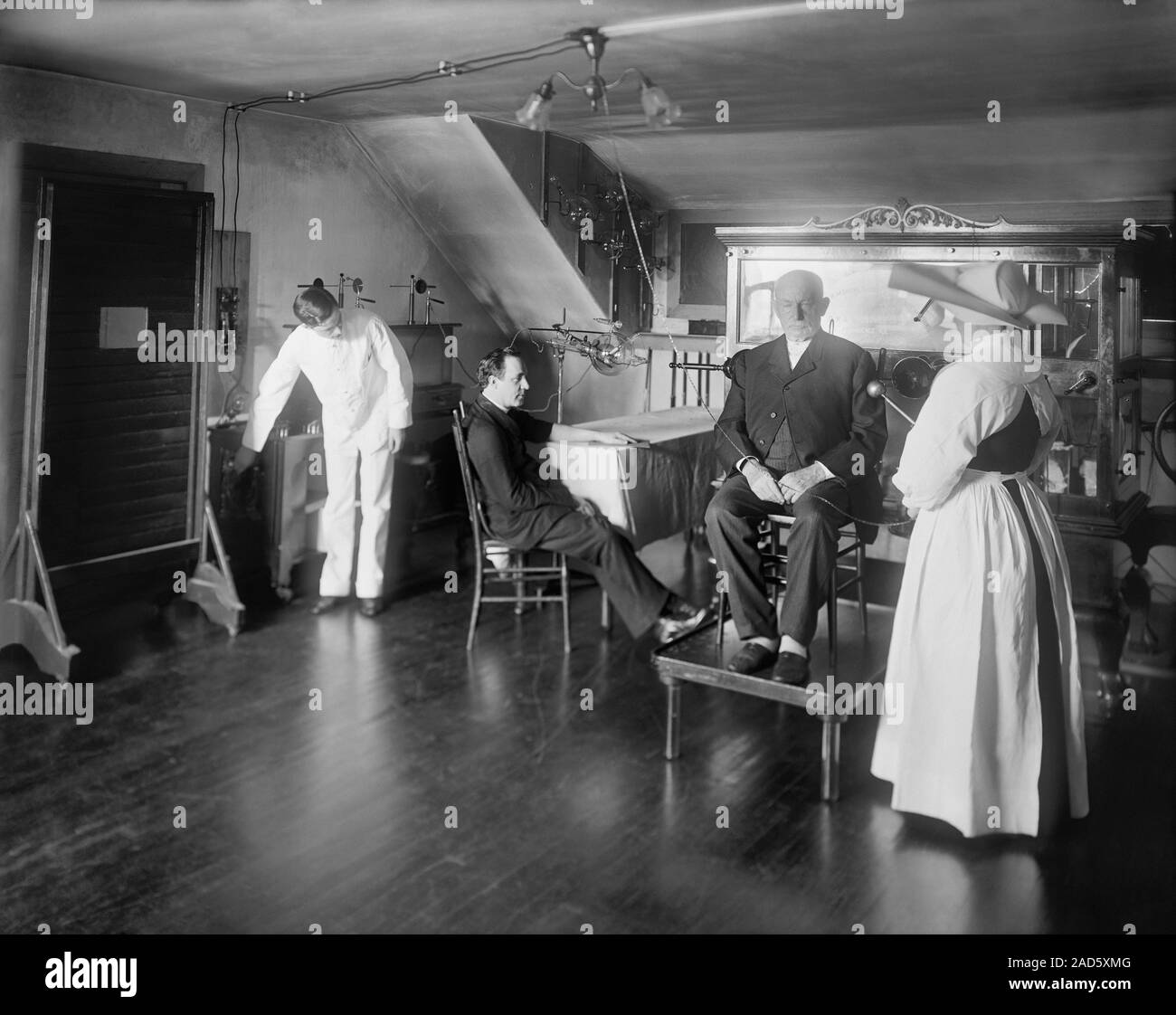 X-ray and electrotherapy treatments. Patients being treated at a ...