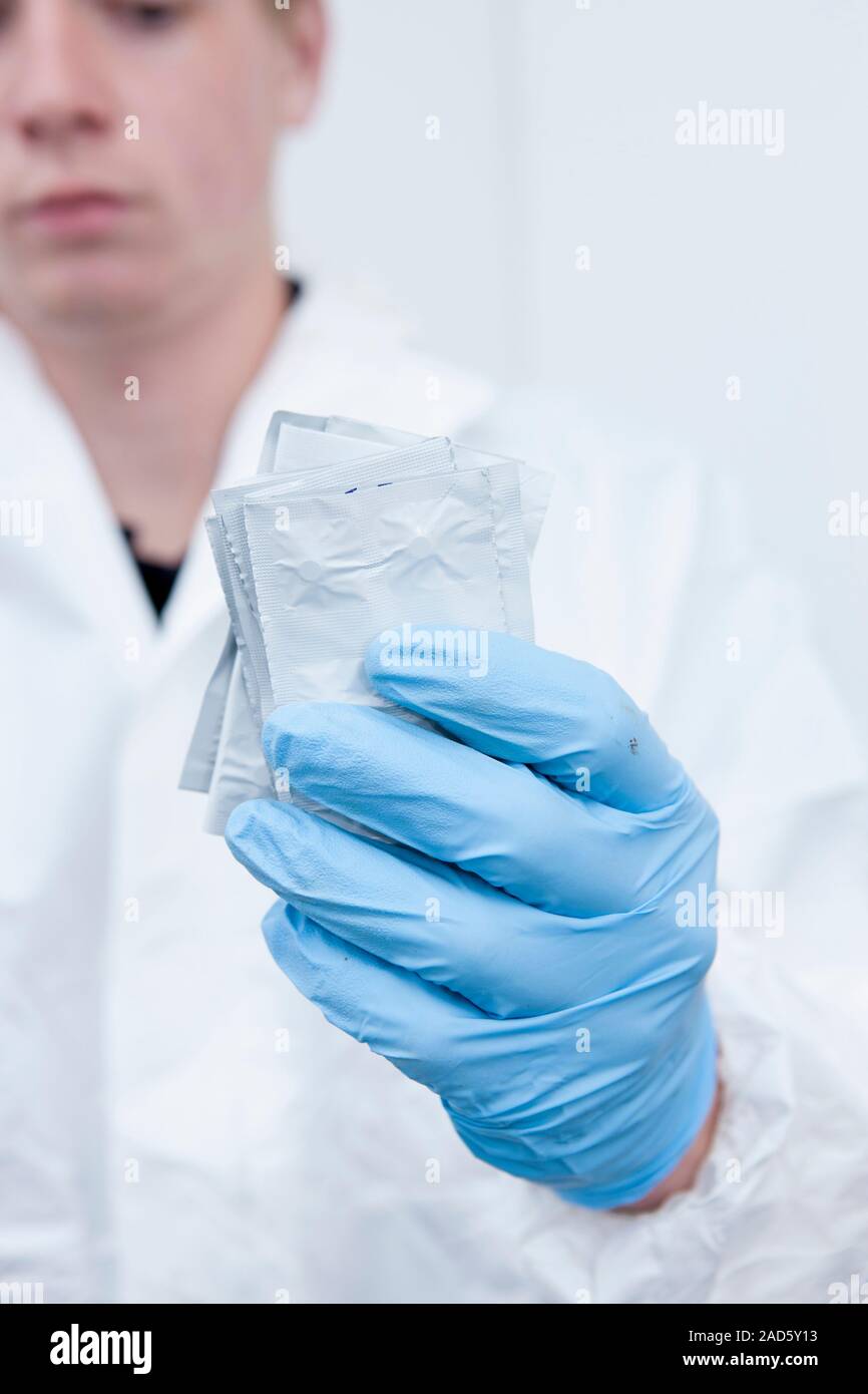 Water disinfectant tablets production. Packets of tablets of the water ...