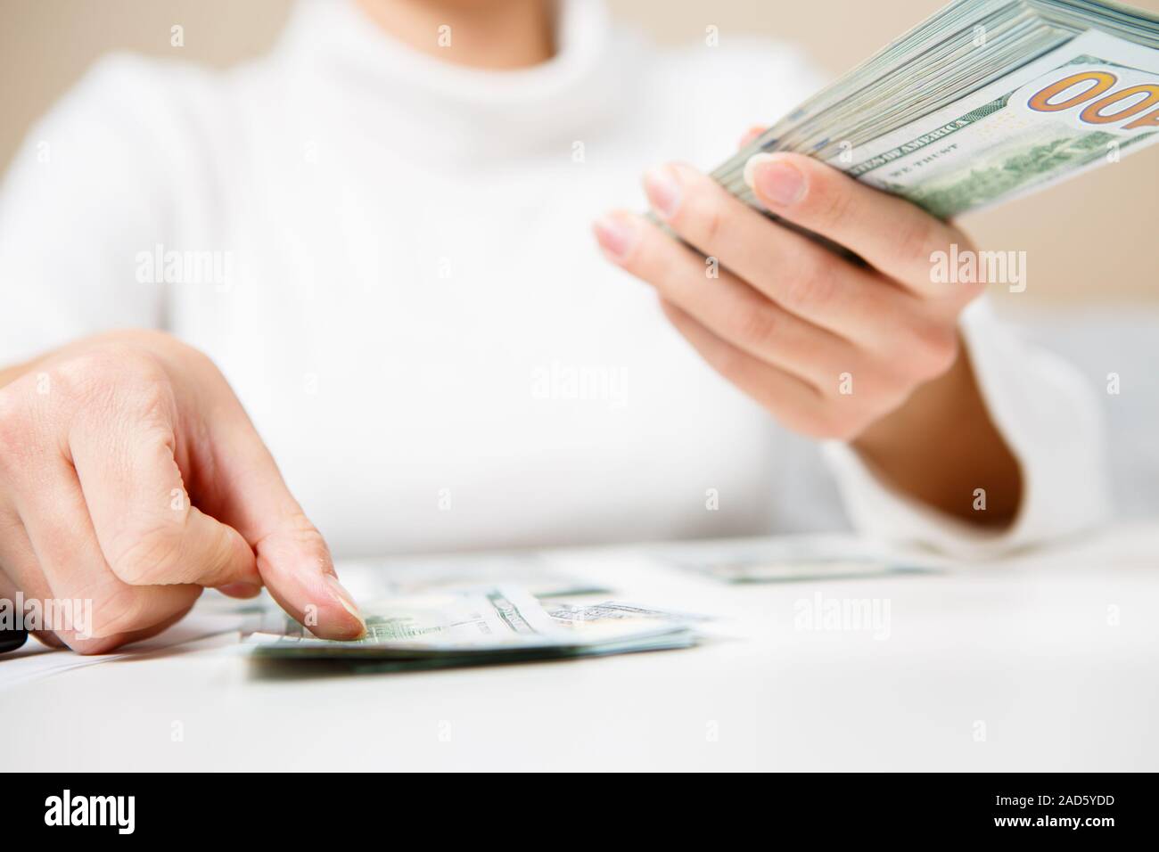 Counting paper money close hi-res stock photography and images - Alamy