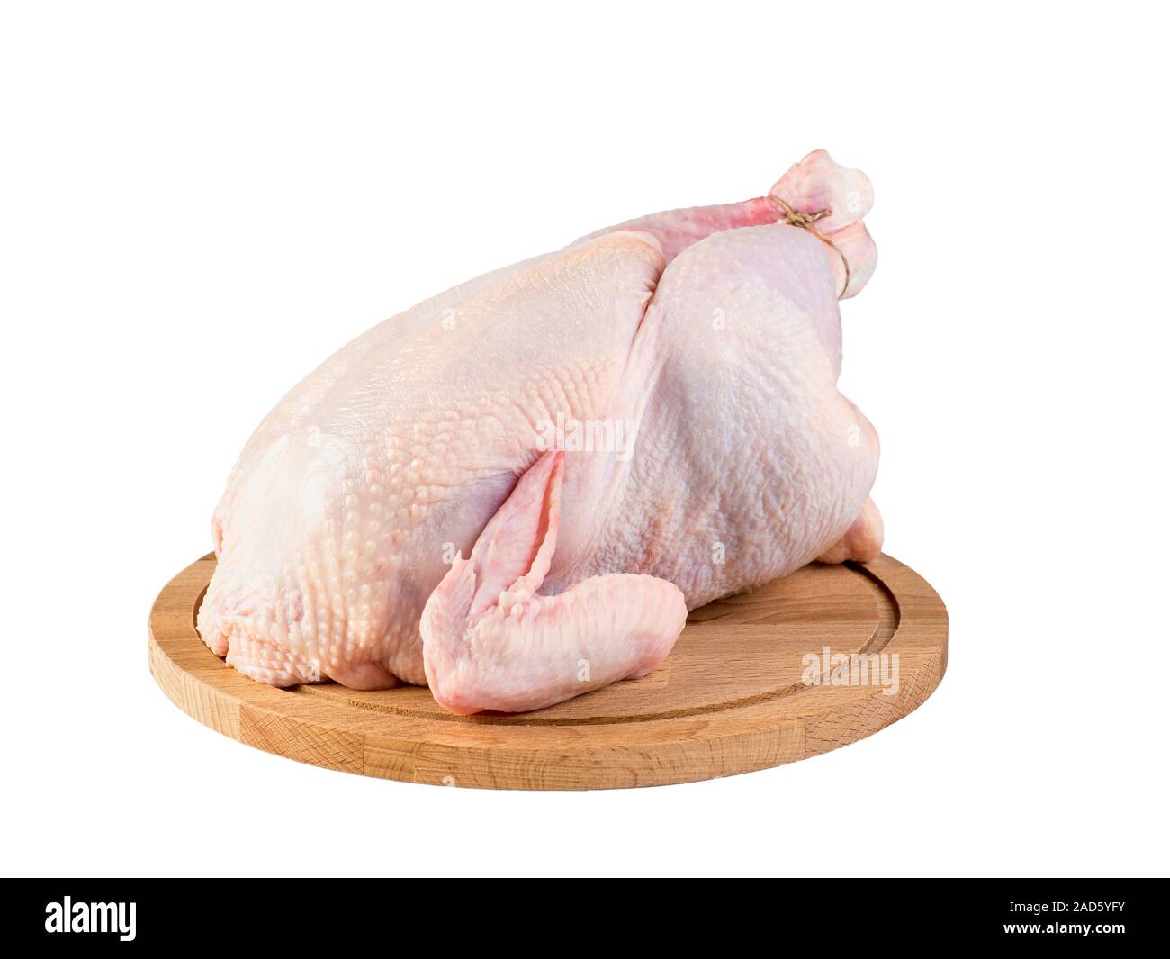 whole carcass of raw chicken on cutting Board, side view, isolated ...
