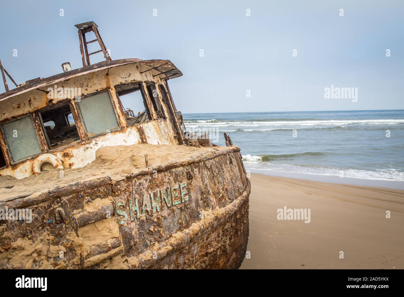 Stranded boat at the coast of the Namibian Desert Stock Photo - Alamy