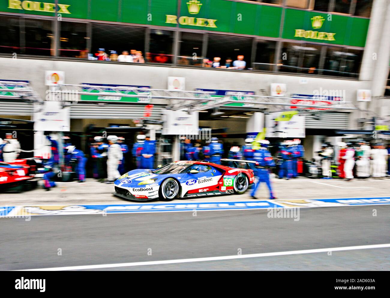 Le Mans 2016. Ford Chip Ganassi Team USA's Ford GT (centre) leaving the ...