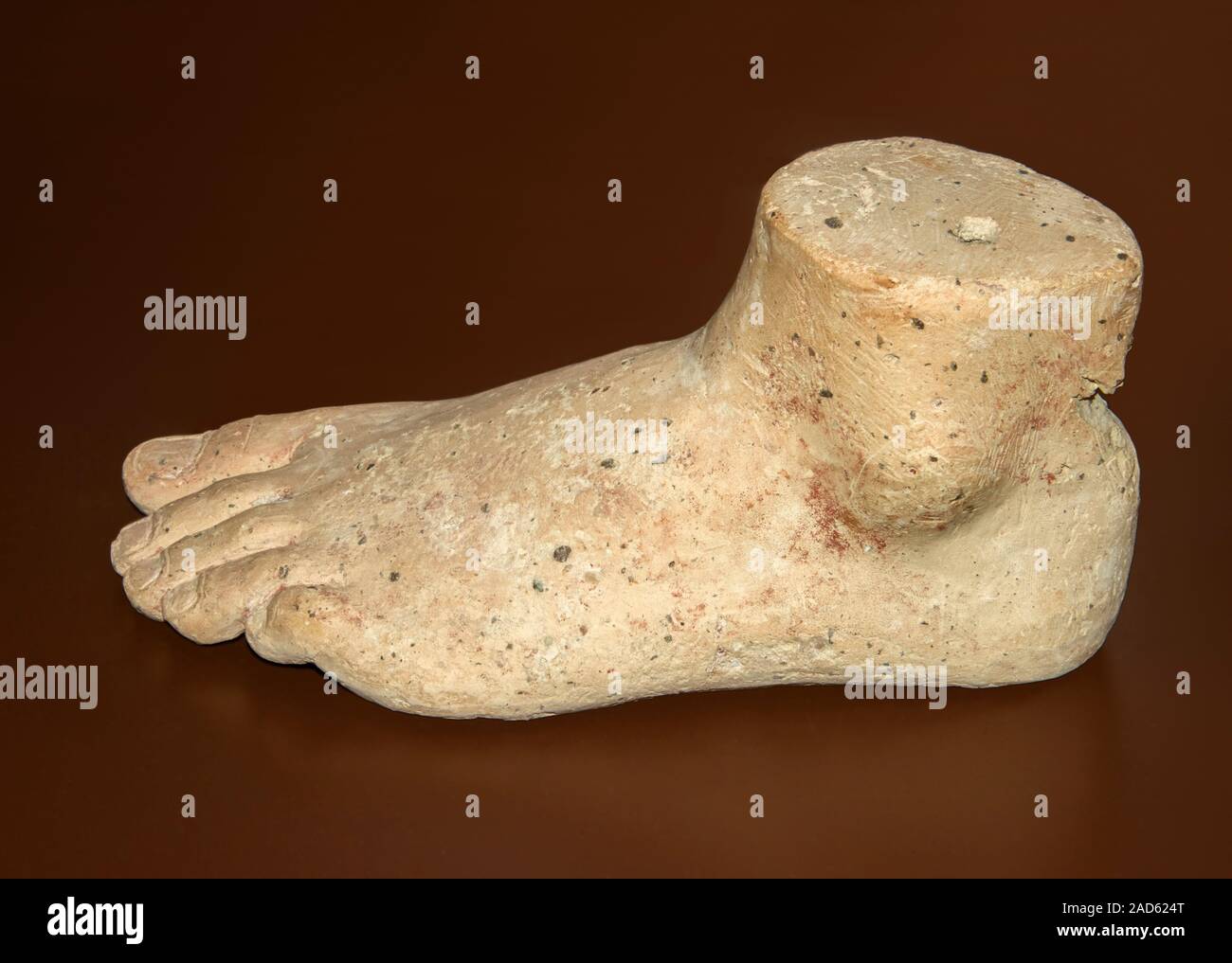 Greek votive foot sculpture. Votive offerings are representations of ...