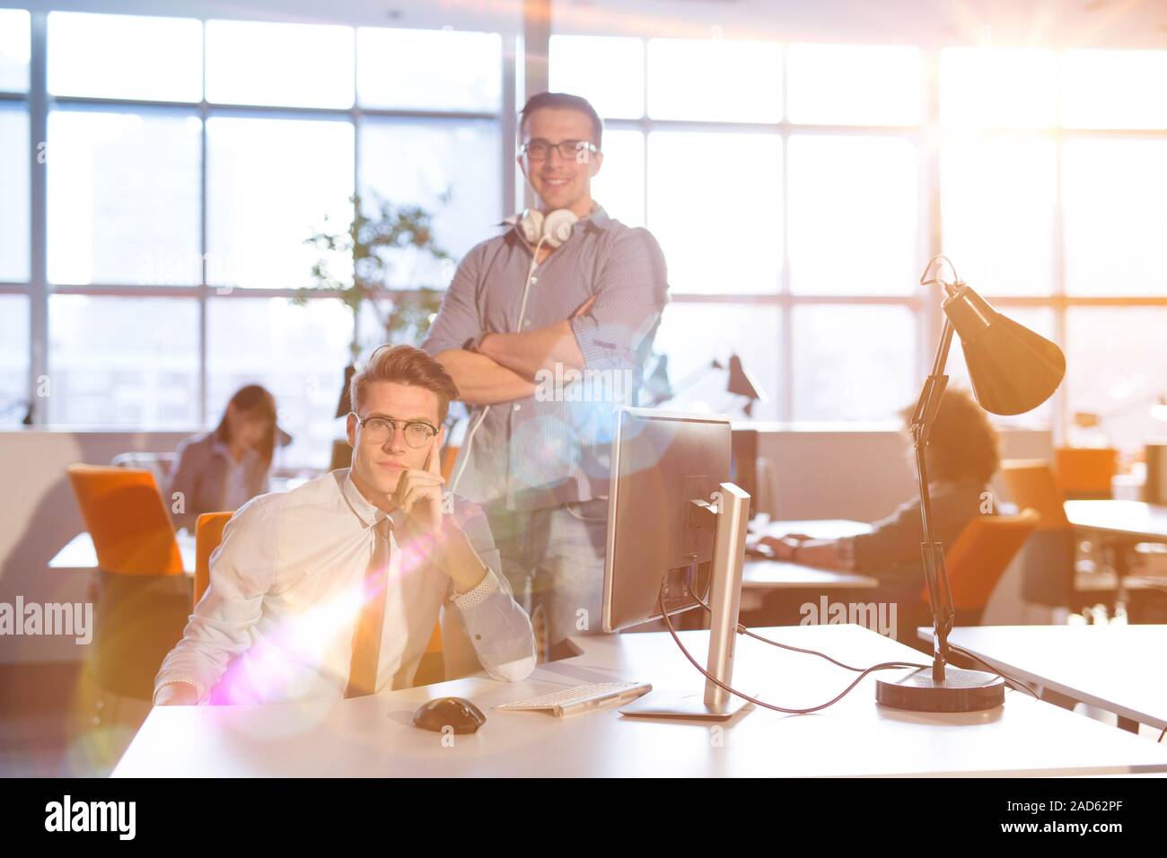 Businessman helping colleague hi-res stock photography and images - Alamy
