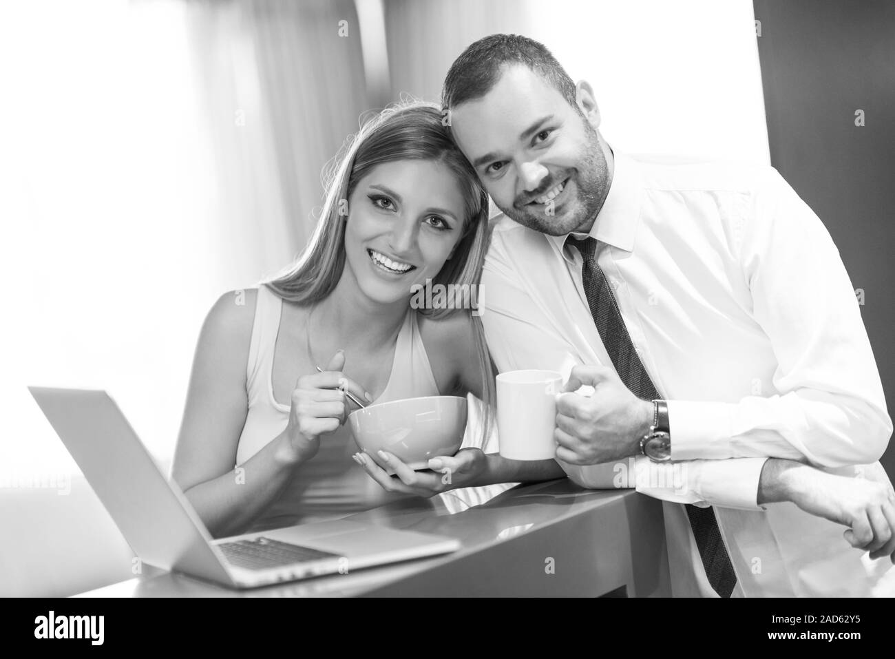 Couple using computer Black and White Stock Photos & Images - Alamy