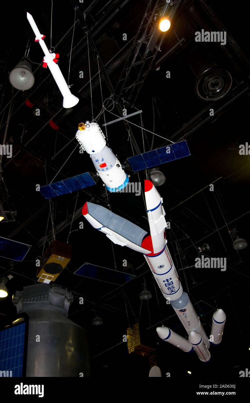 A model of a Chinese Shenzhou manned spacecraft being launched by a ...