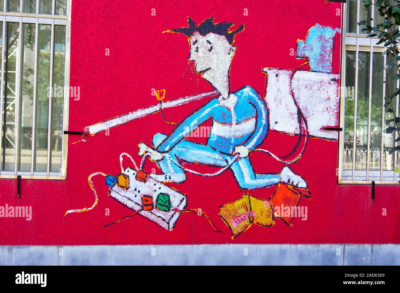 One of a set of paintings on an apartment wall in Beijing, China ...