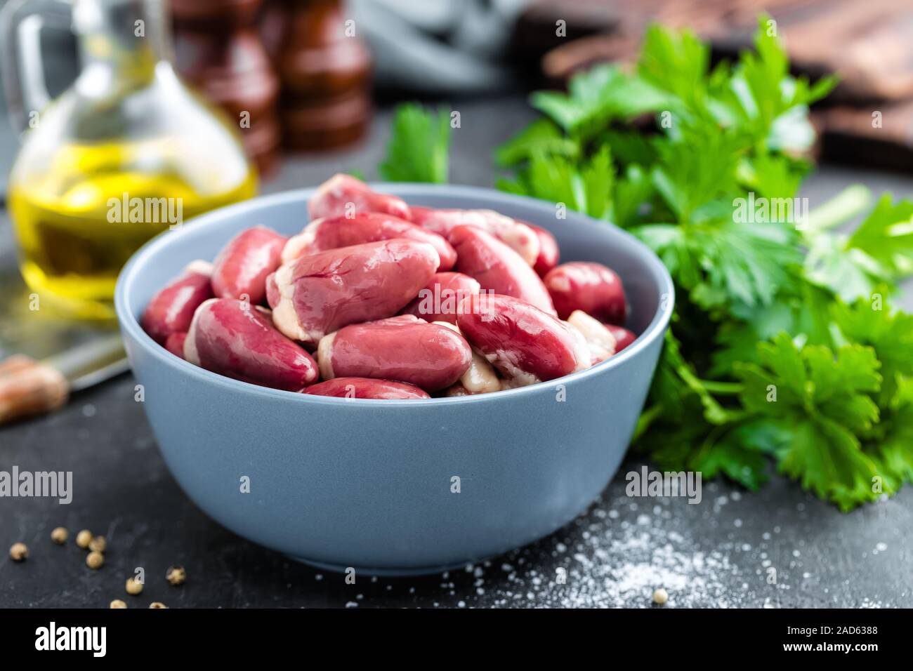 raw chicken hearts Stock Photo - Alamy