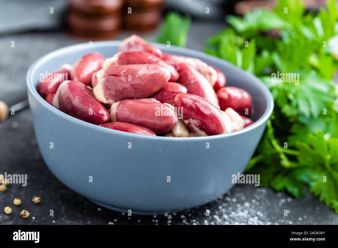 raw chicken hearts Stock Photo - Alamy