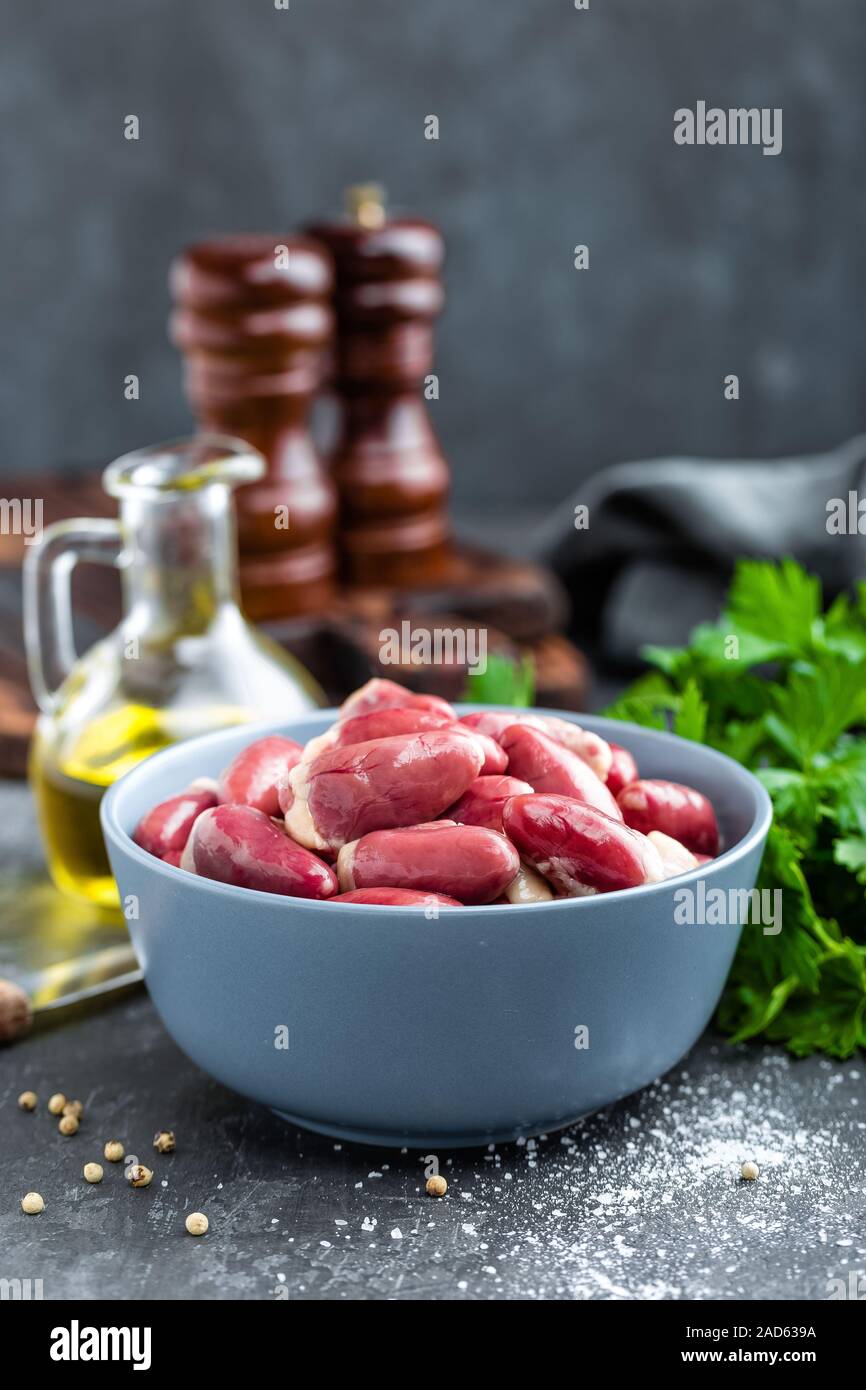 raw chicken hearts Stock Photo - Alamy
