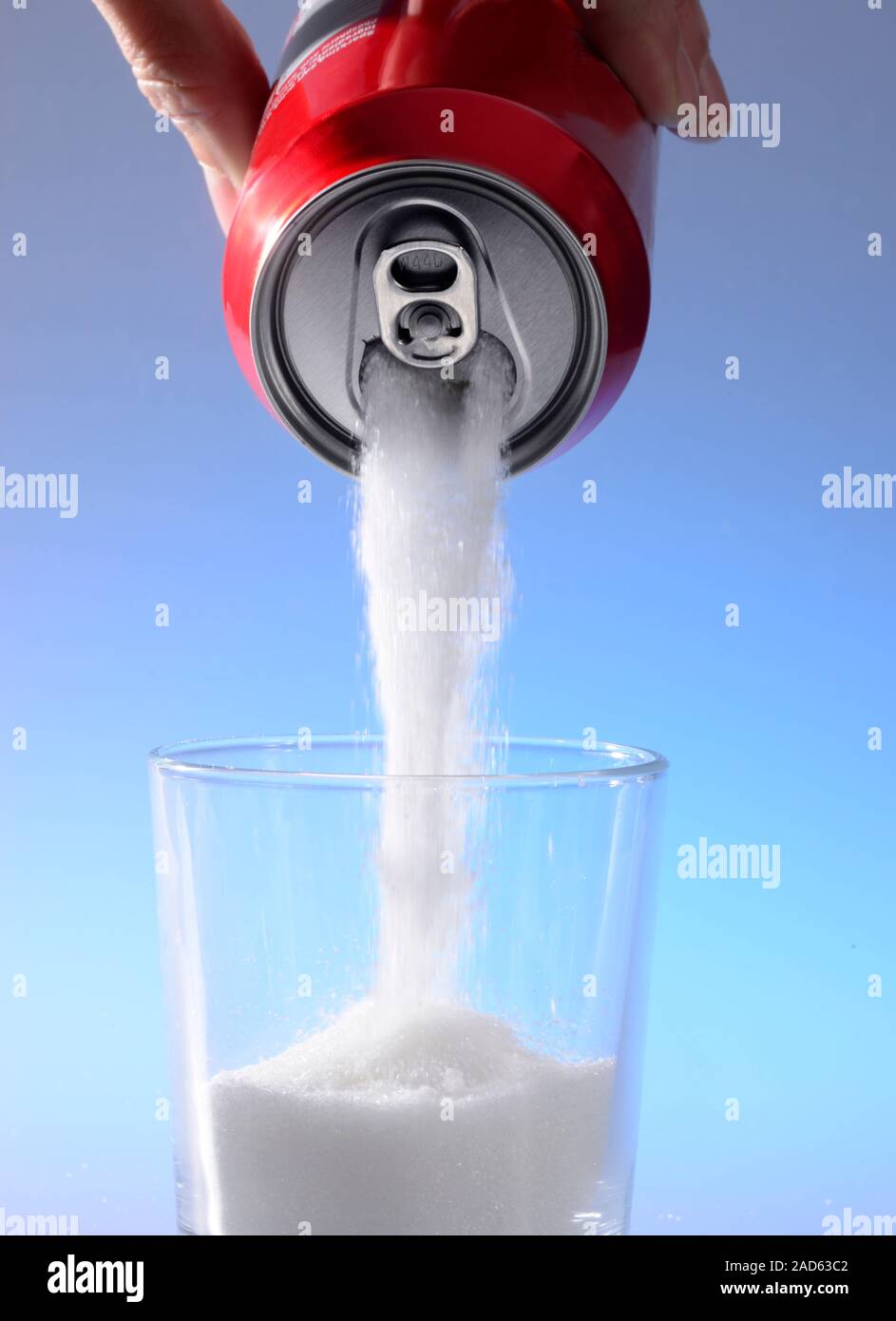 Sugar pouring from a soft drink can Stock Photo - Alamy