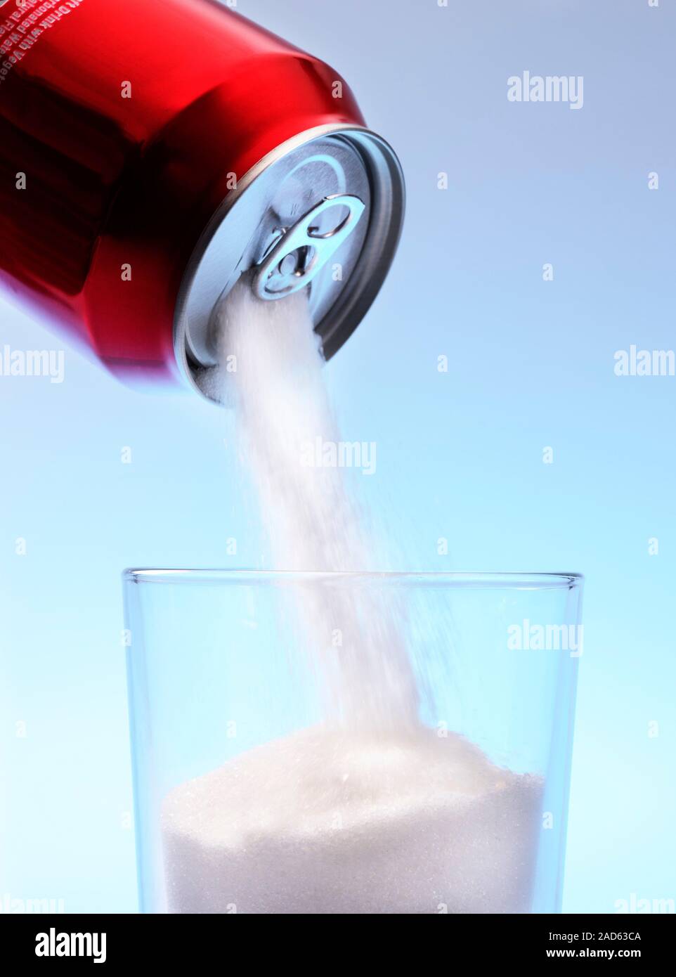 Sugar pouring from a soft drink can Stock Photo - Alamy