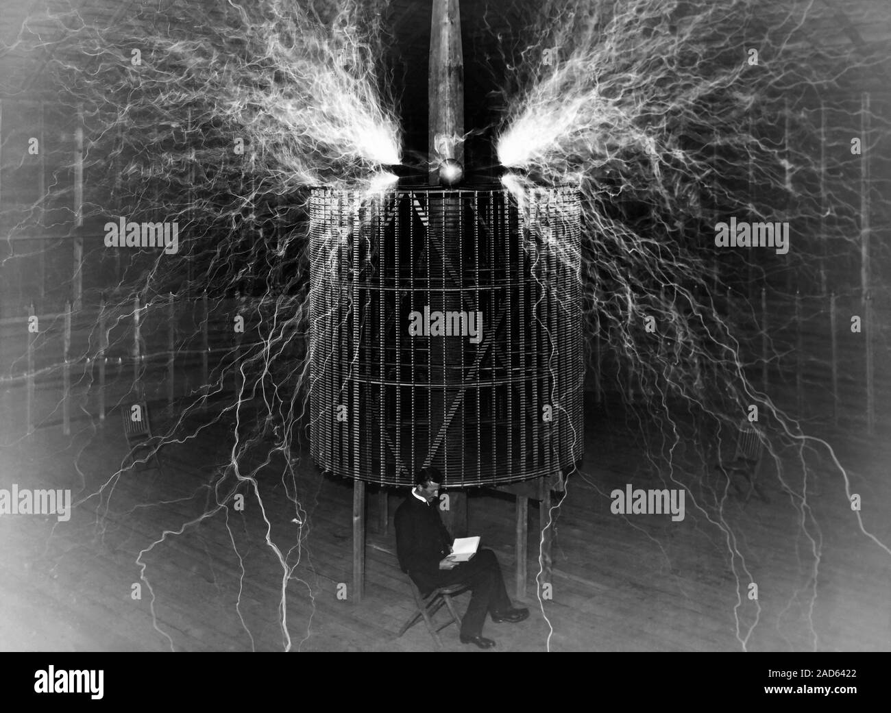 Tesla coil experiment. Electrical streamers sparking outwards from a ...