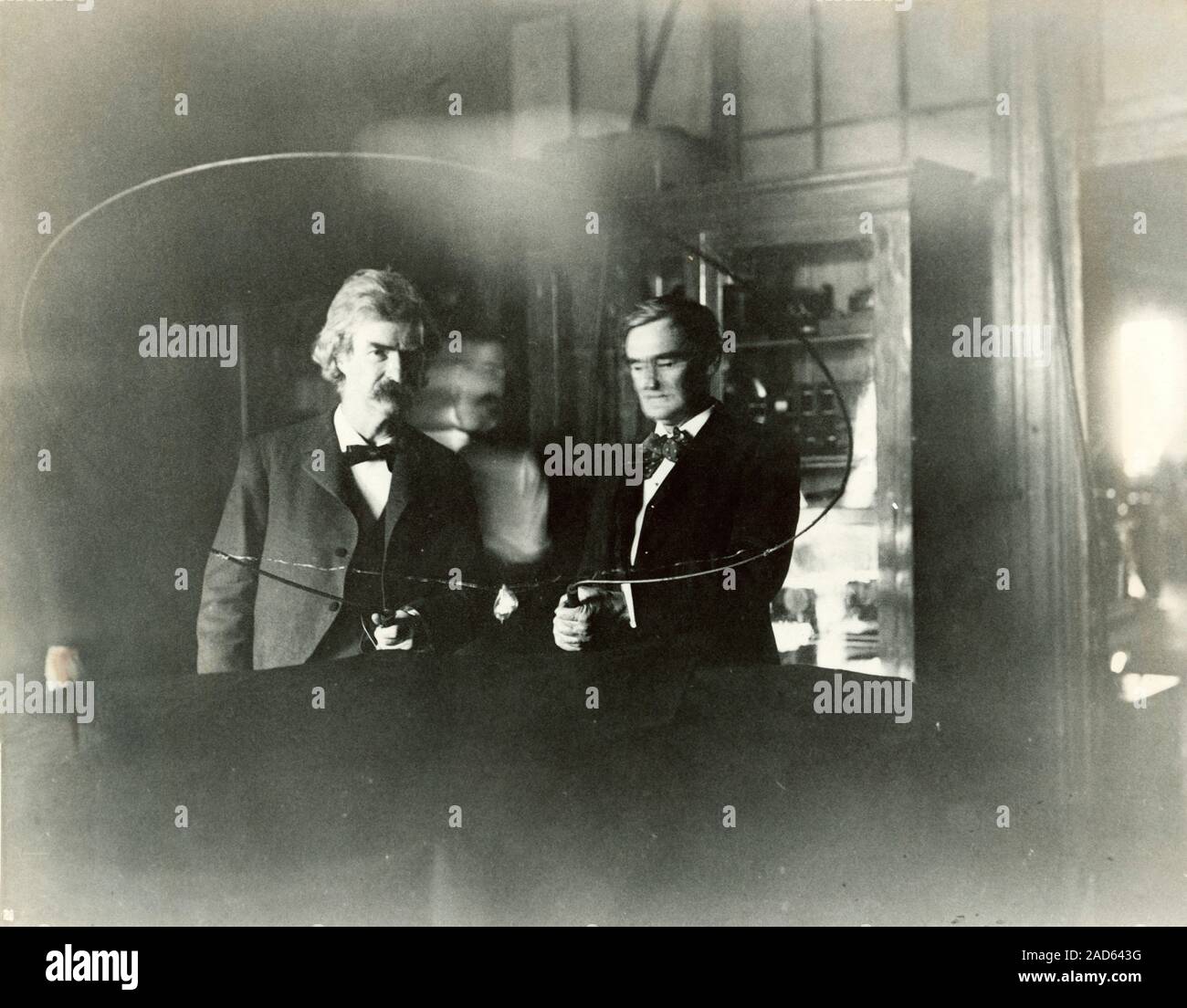 Twain and Jefferson in Tesla's laboratory. US writer Mark Twain (left ...