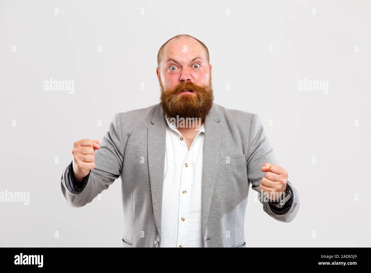 Evil man with ginger beard Stock Photo - Alamy