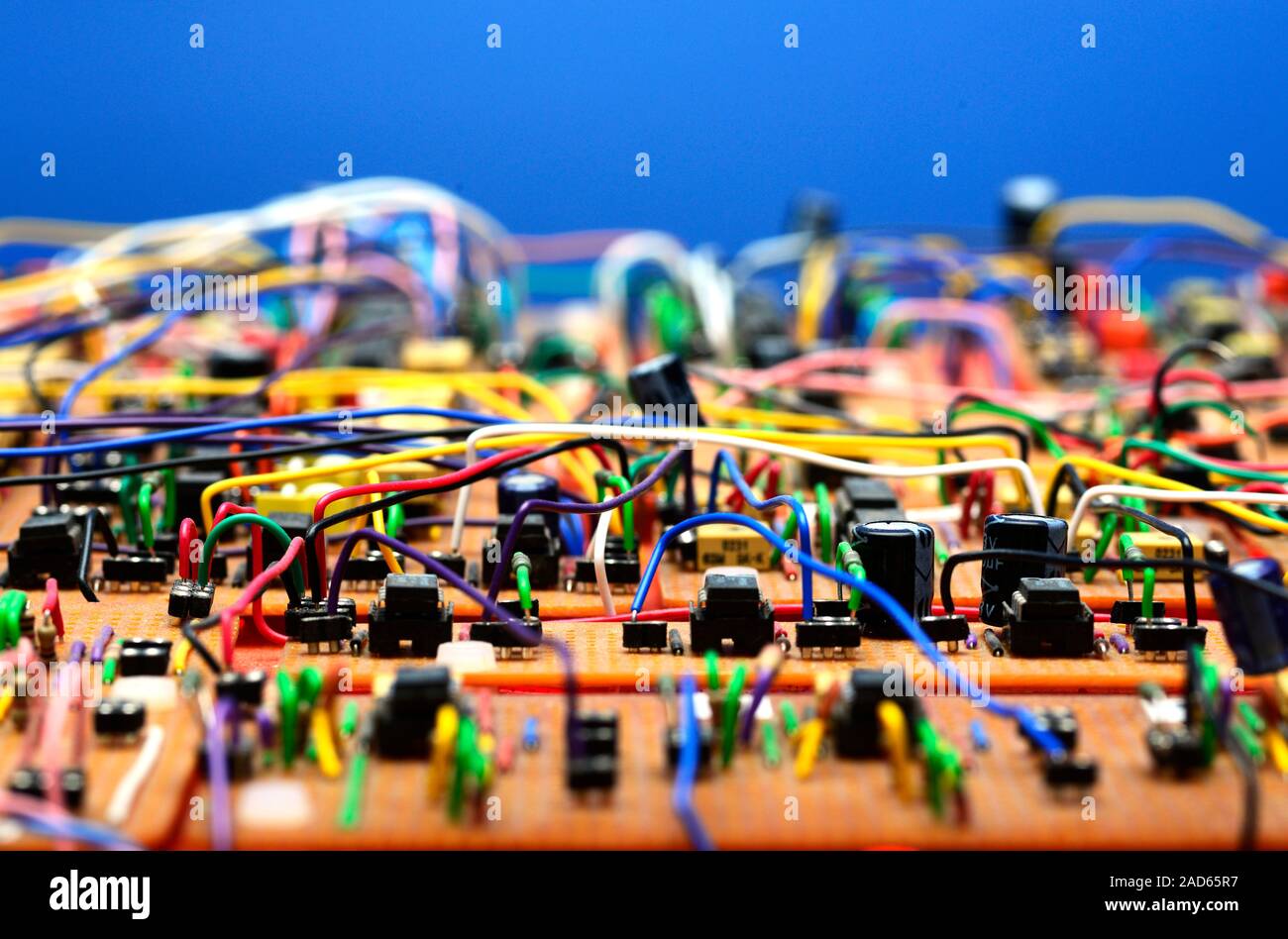 Circuit boad. Colourful wires and electronic components on a circuit ...