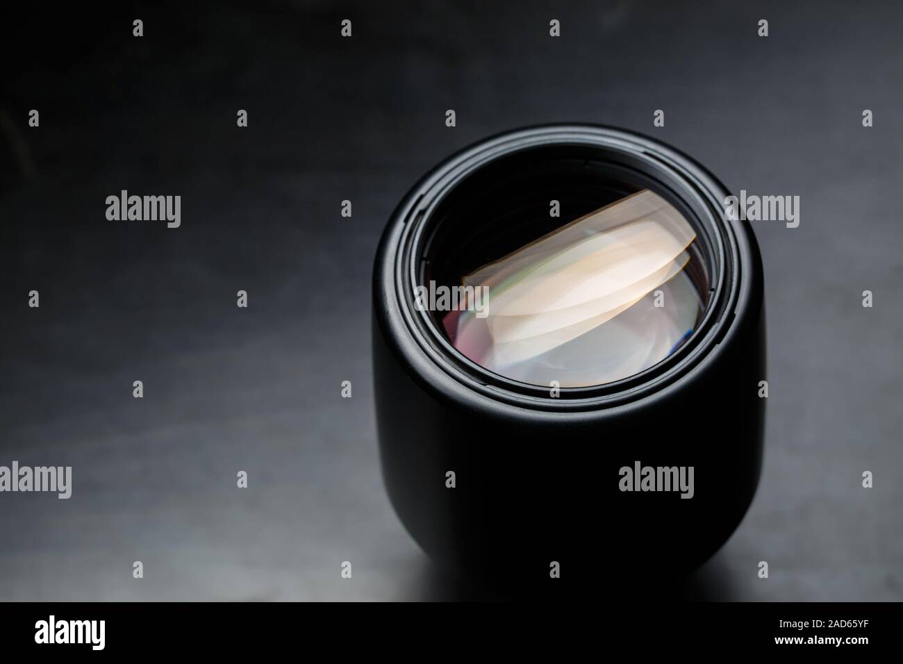Camera lens on black background Stock Photo - Alamy