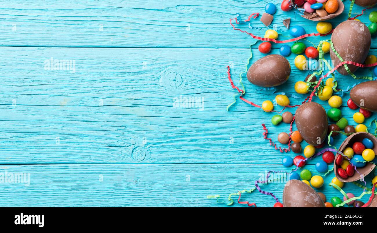 Chocolate eggs, jelly beans, ribbons Stock Photo - Alamy