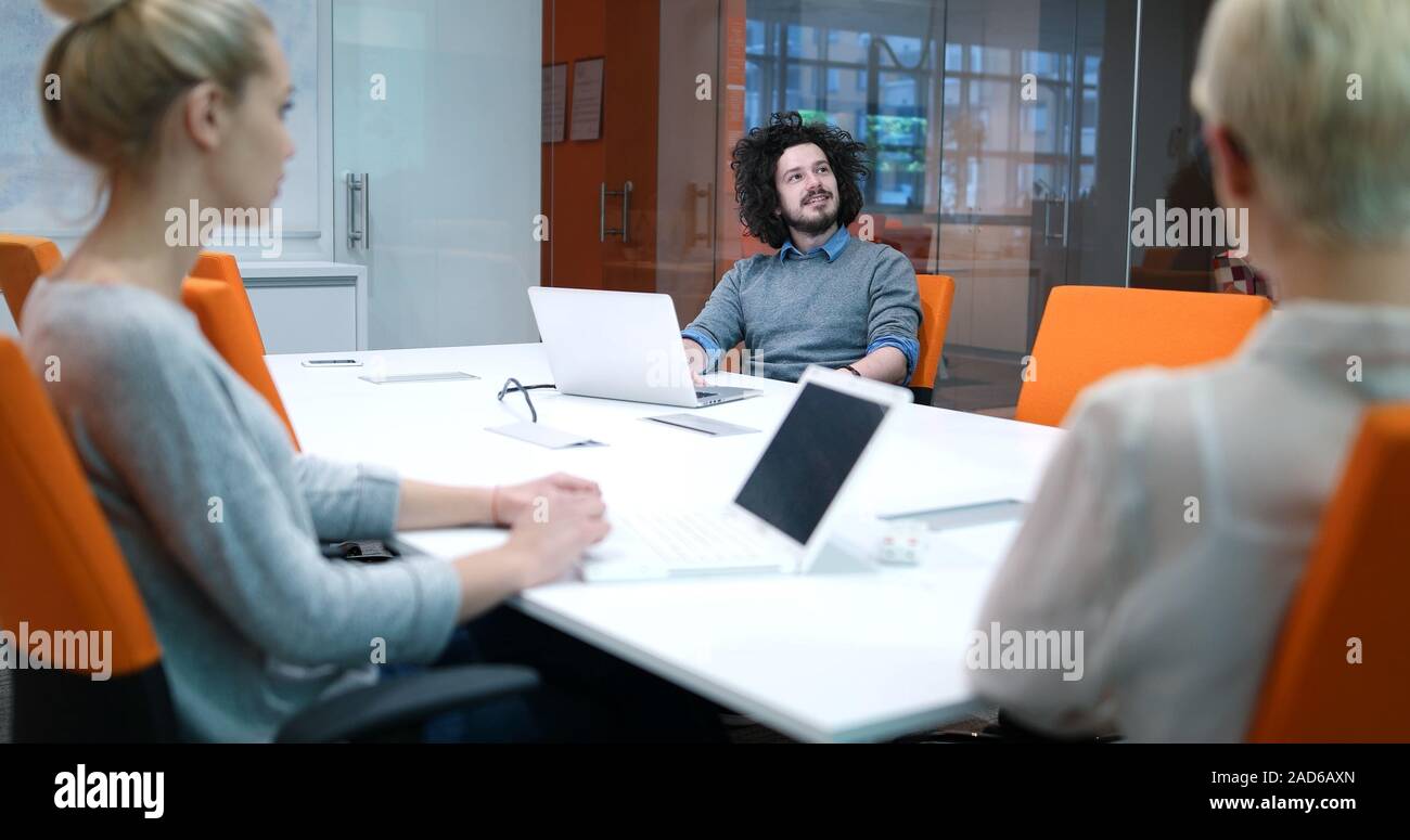 Startup Business Team At A Meeting at modern office building Stock ...