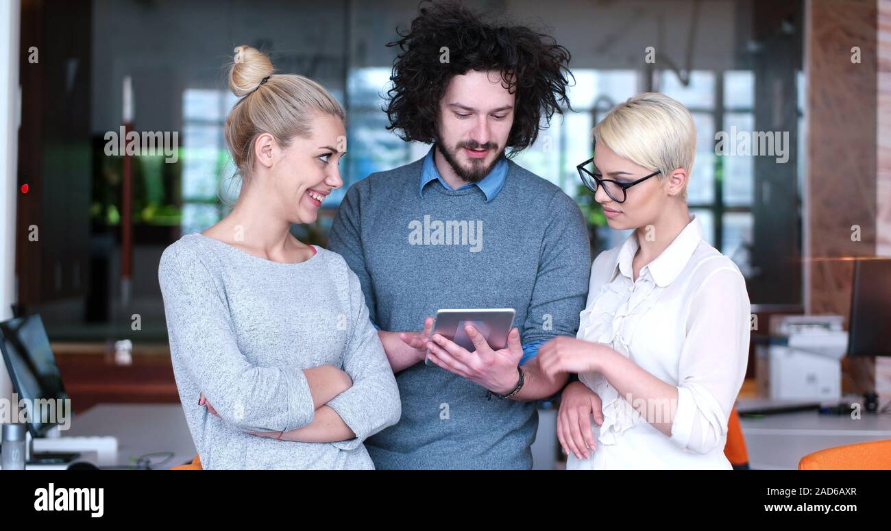 Startup Business Team At A Meeting at modern office building Stock ...