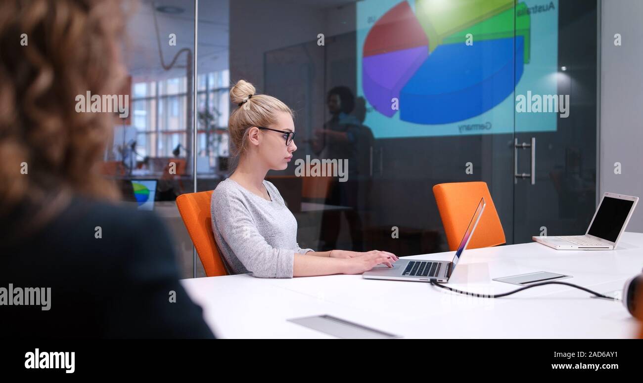 Startup Business Team At A Meeting at modern office building Stock ...